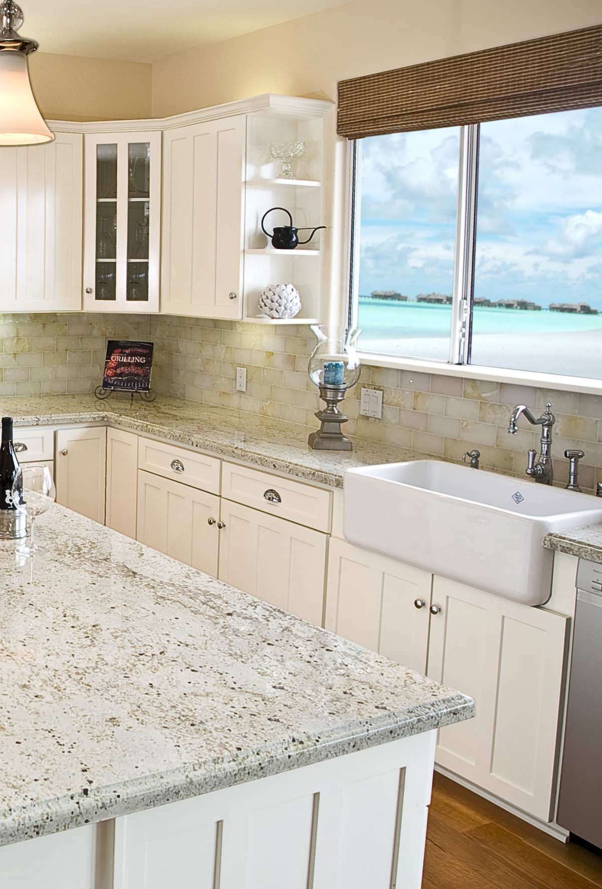 Beige Granite Countertop With White Kitchen Cabinets